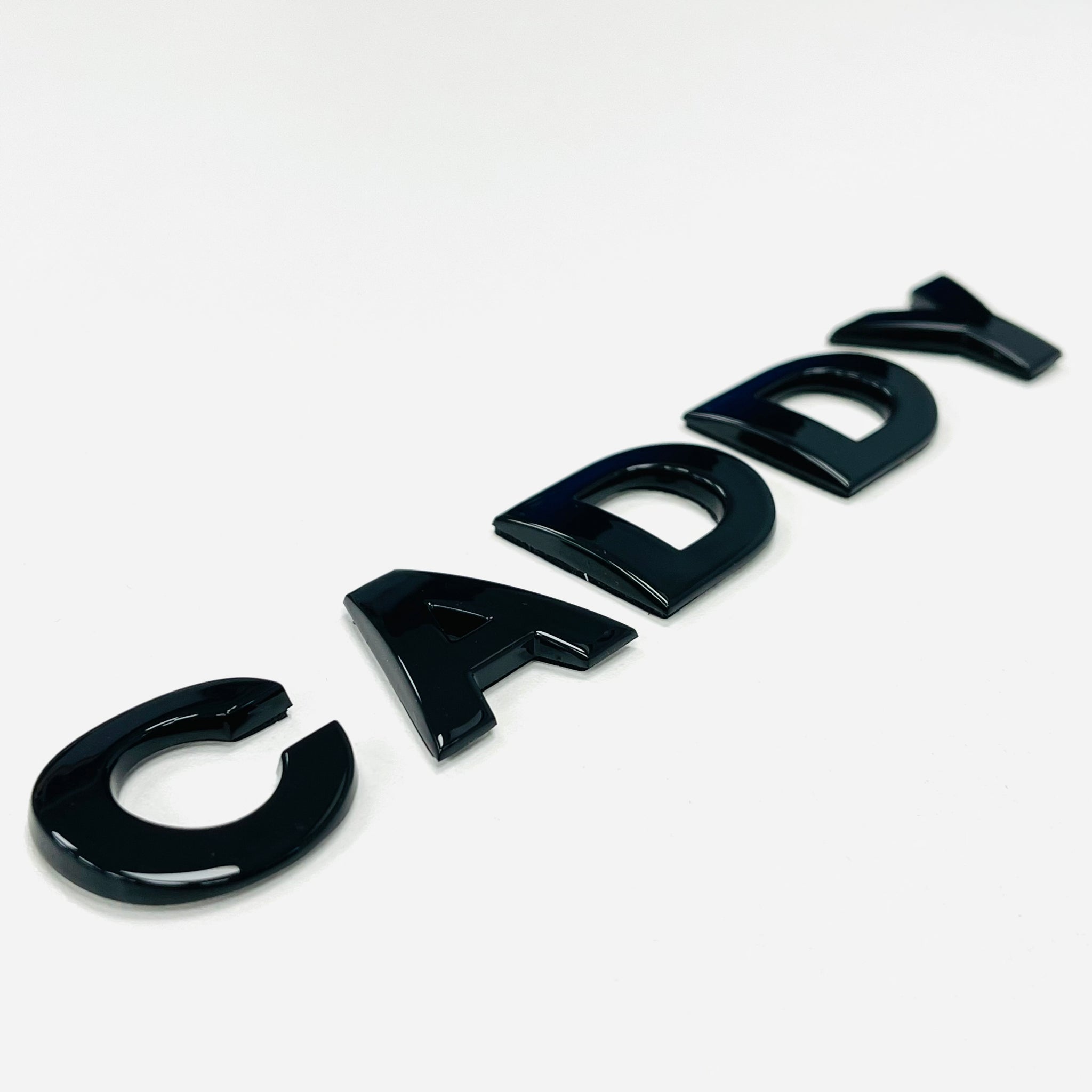 CADDY gloss black badge – custom-caddy-vans
